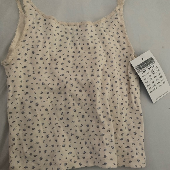 Brandy Melville | Tops | Brandy Melville White Tank With Blue Flowers ...